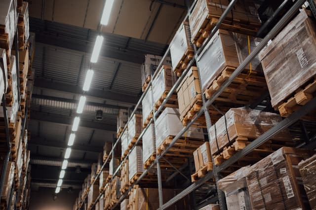 AGV Price Guide 2026: $10K–$200K — How Much Does an AGV Cost? | GrabaRobot